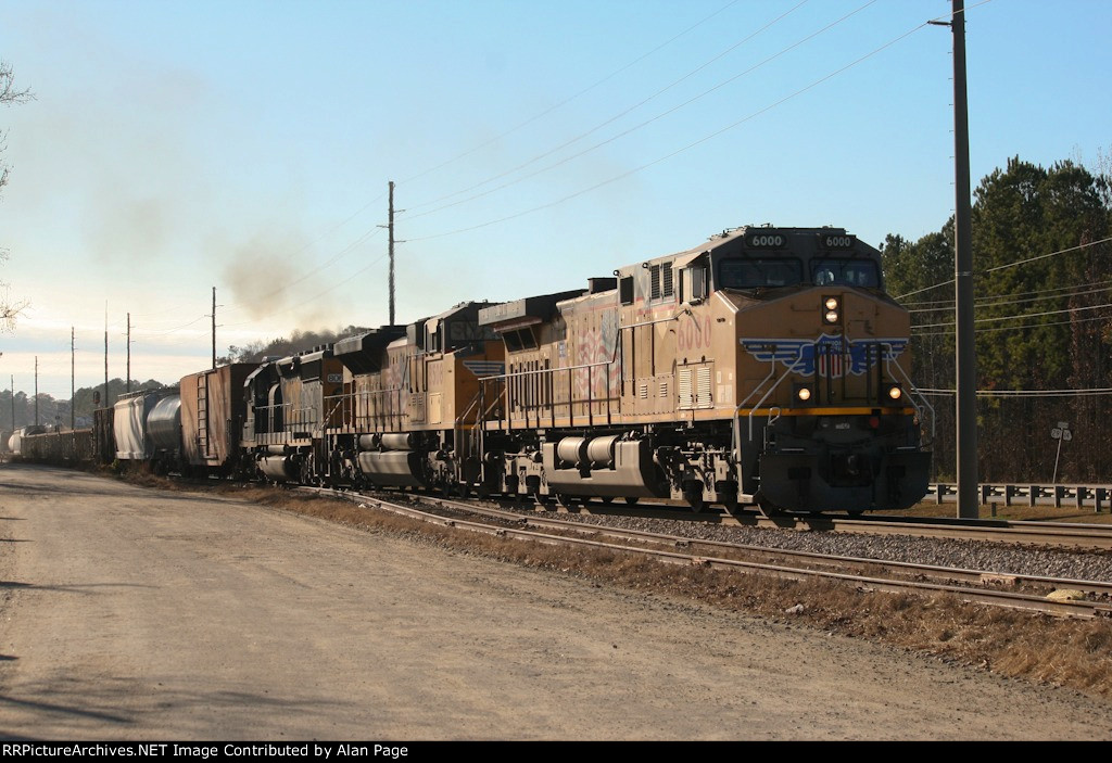 UP 6000, 8508, and CSX SD40-2 8066 roll NB